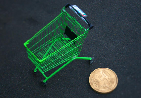 Design Studio Fabricates Giant Coin to Make Large Objects Appear Tiny ...